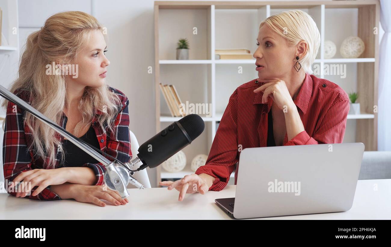 Podcast streaming expert Interview women speaking Stock Photo - Alamy