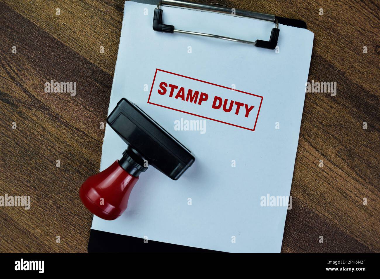 Concept of Red Handle Rubber Stamper and Stamp Duty text isolated on on ...