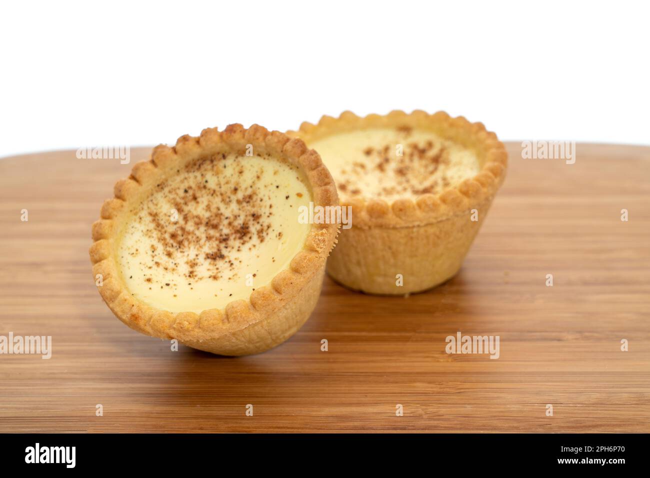 Two Custard tarts Stock Photo - Alamy
