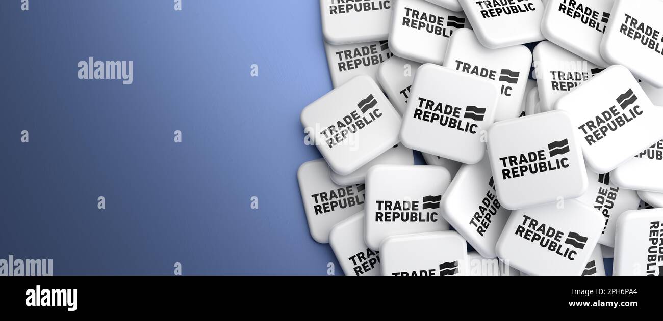Logos of the German neo broker Trade Republic on a heap on a table. Web ...