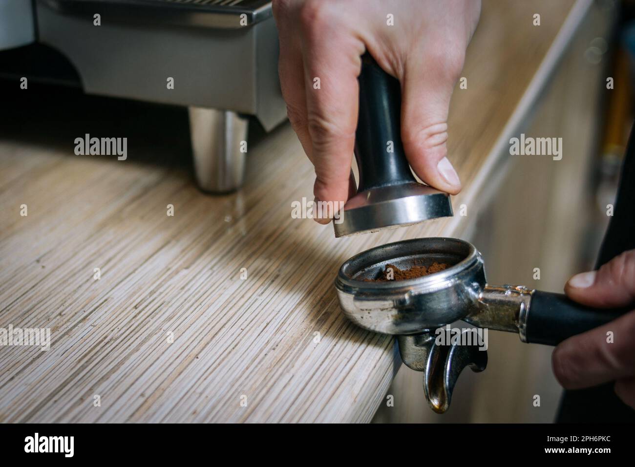 coffee shop equipment barista tamper press holder Stock Photo - Alamy