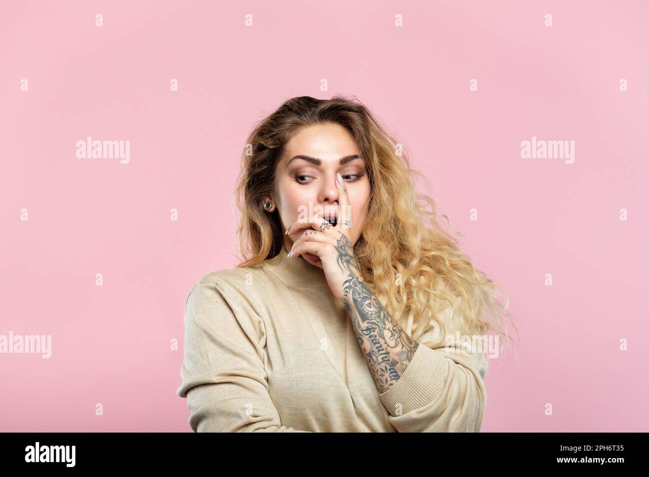 shocked astounded girl cover mouth emotional face Stock Photo - Alamy