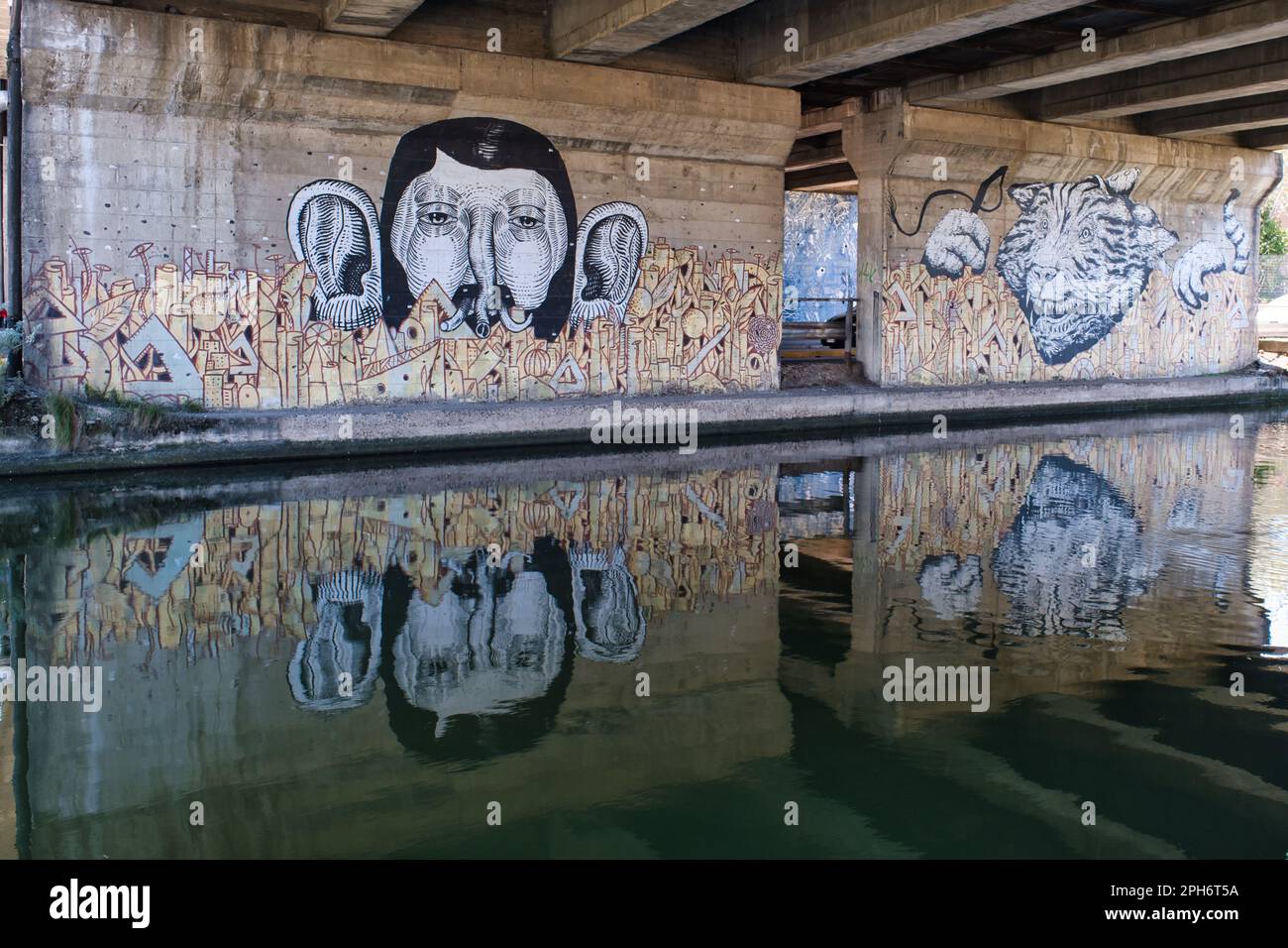 Creative graffiti under an overpass in Cagliari Stock Photo - Alamy