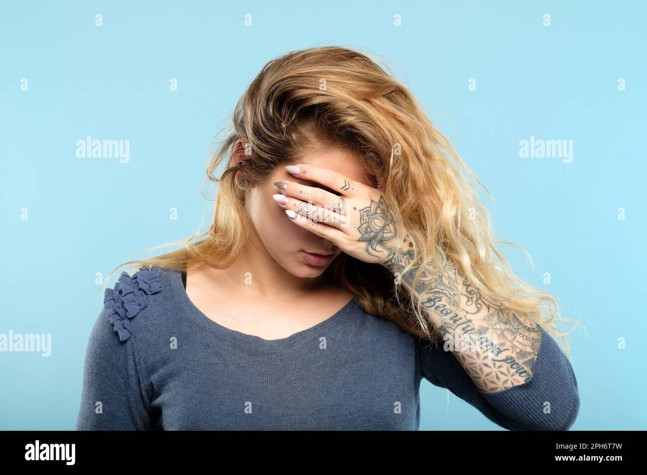 facepalm shame emotion upset girl cover face Stock Photo - Alamy