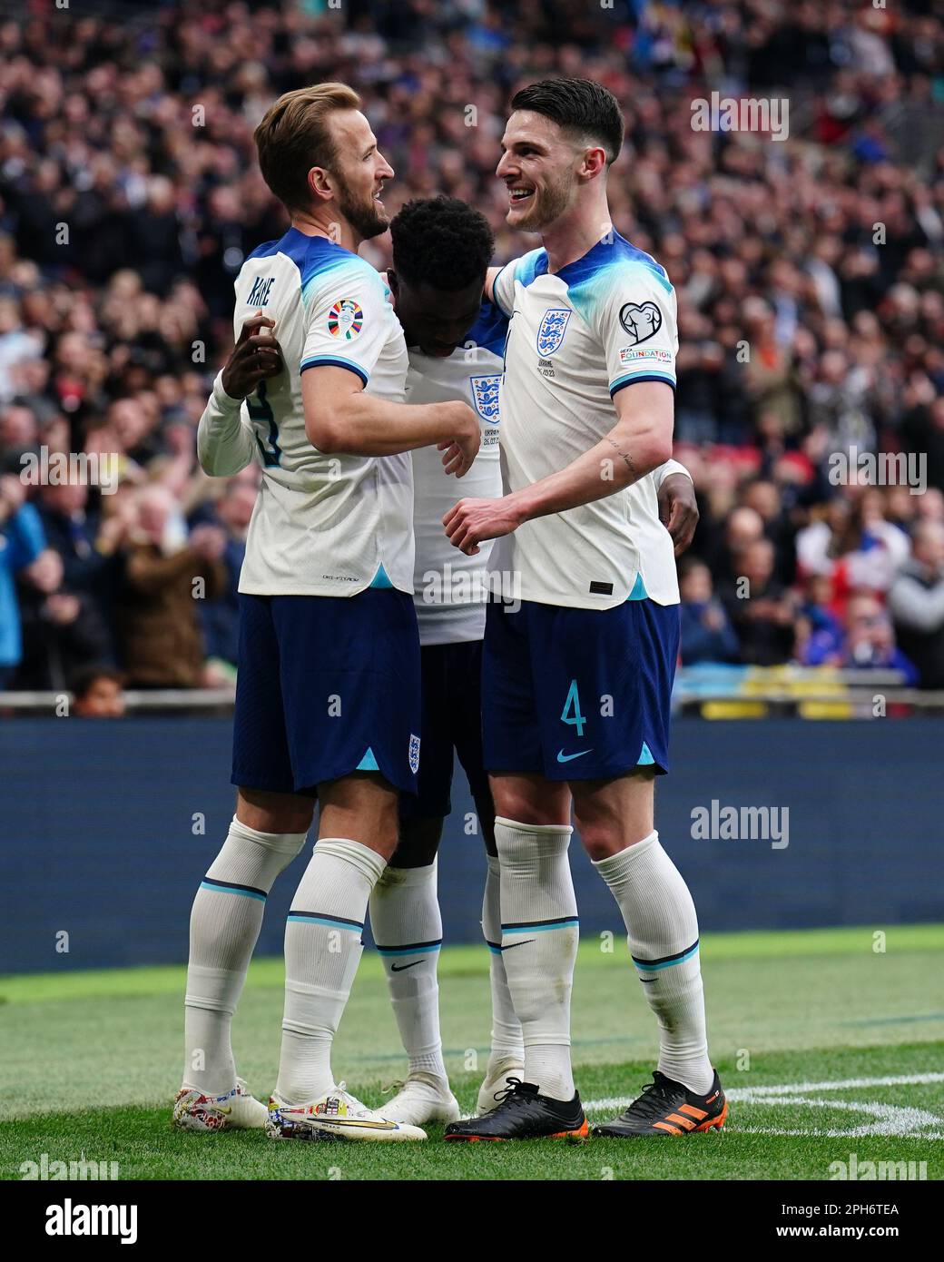England’s Bukayo Saka (centre) celebrates scoring his sides second goal ...