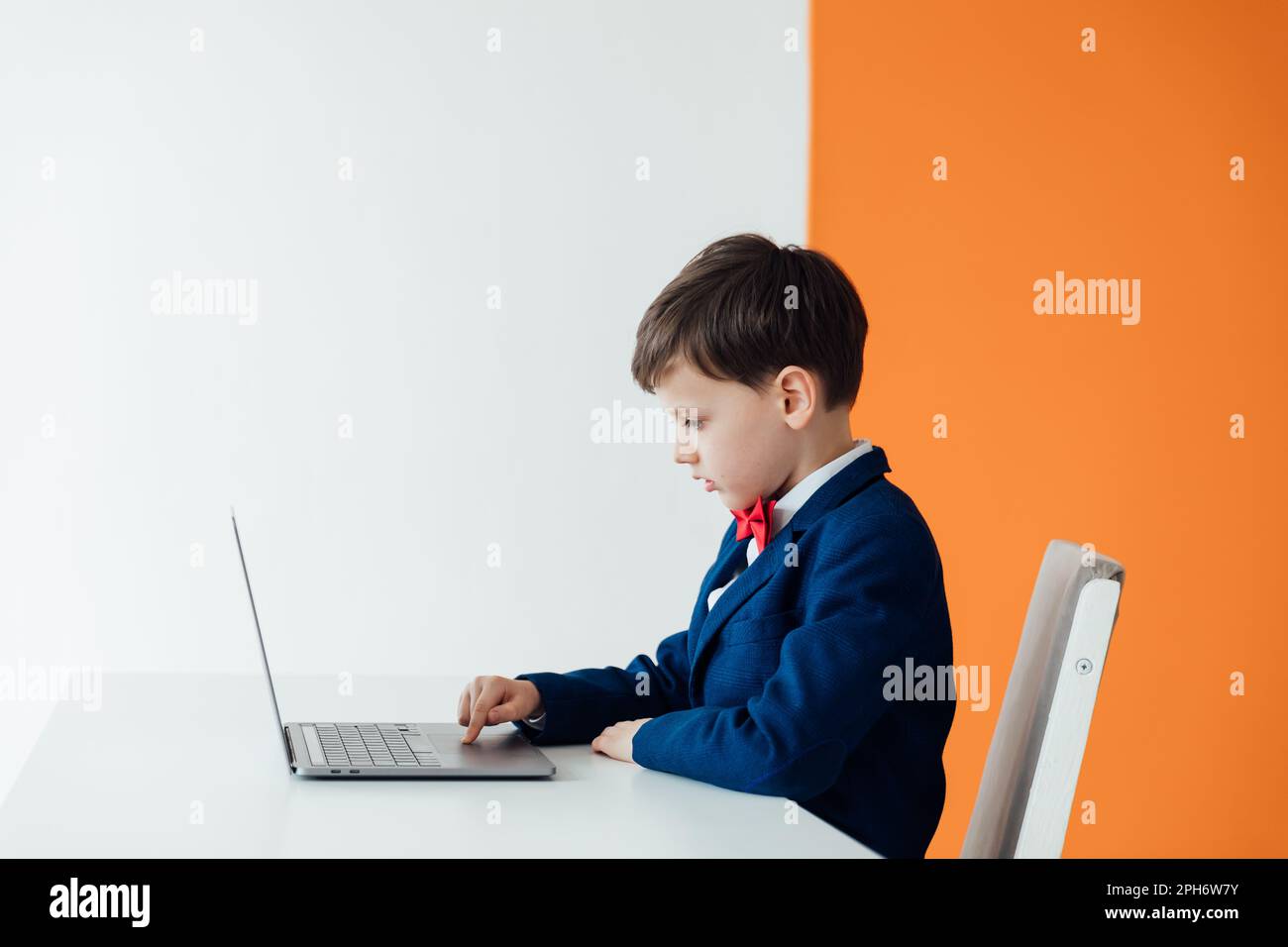 boy sits at laptop to school classroom education computers Stock Photo ...