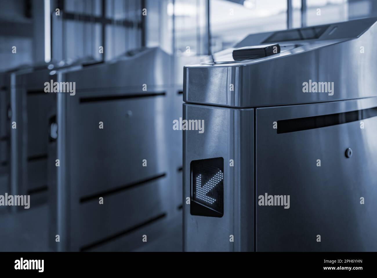 Ticket validator gates at train station Stock Photo - Alamy