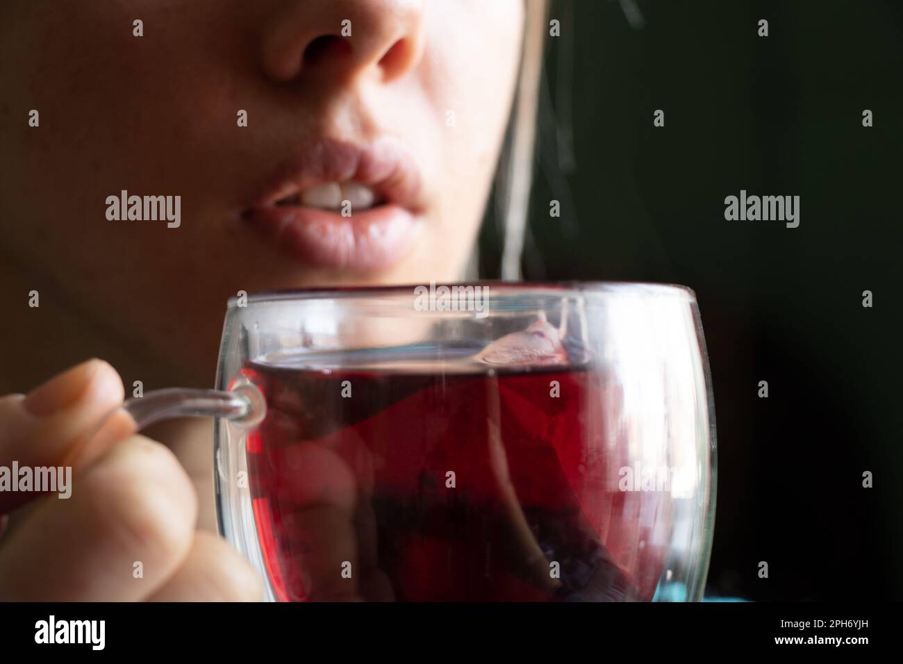 Hold cup up close lips hi-res stock photography and images - Alamy