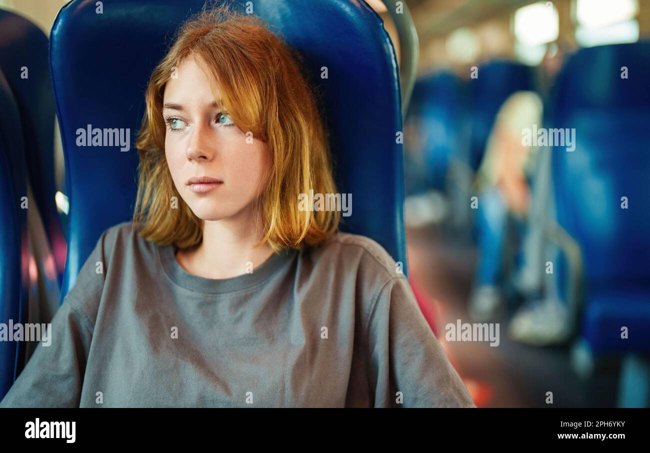 Teenage girl travelling inside the train Stock Photo - Alamy