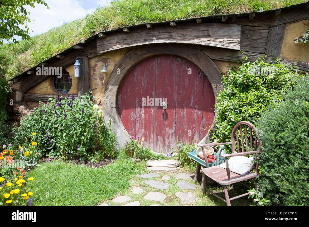 The view of a round shape entrance to the tiny fairy tale house in New ...