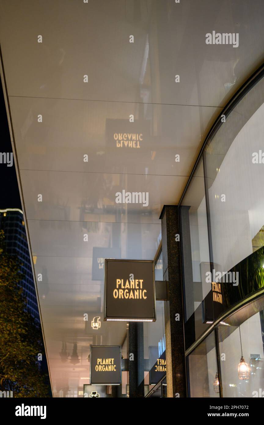 LONDON - November 12, 2022: A bright, glowing sign for Planet Organic ...