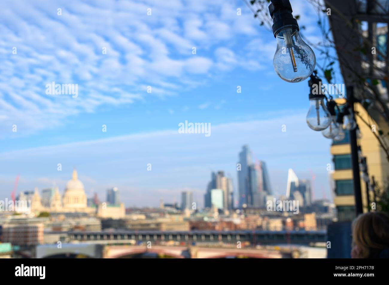 LONDON - November 13, 2022: A row of outdoor light bulbs with St Paul's ...