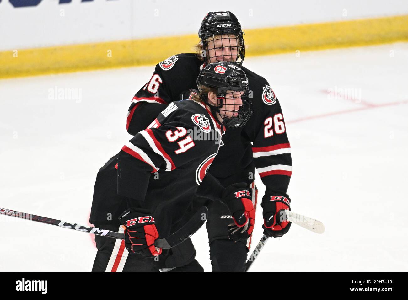 St. Cloud State Huskies forward Adam Ingram (34) and St. Cloud State ...