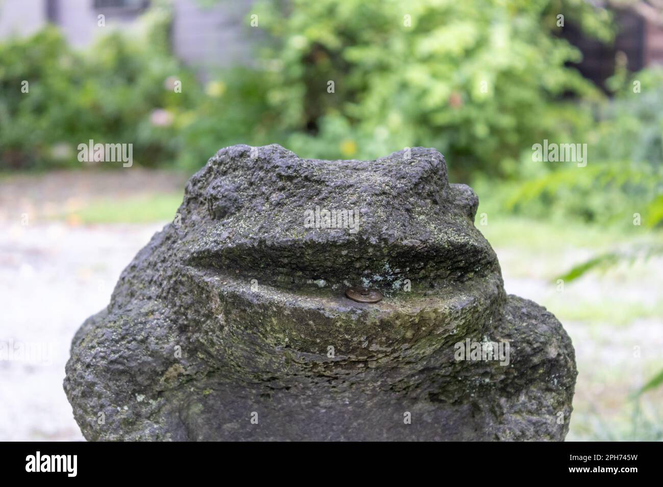 Stone frog with 50 yen coin in its mouth, Kanazawa, Japan Stock Photo ...