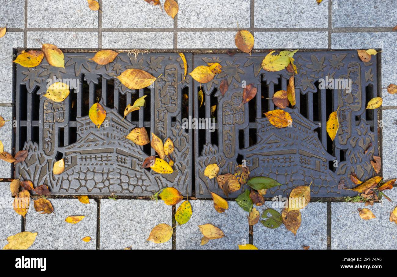 Drain cover with leaves, Maruoka Castle, Sakai, Fukui prefecture, Japan ...