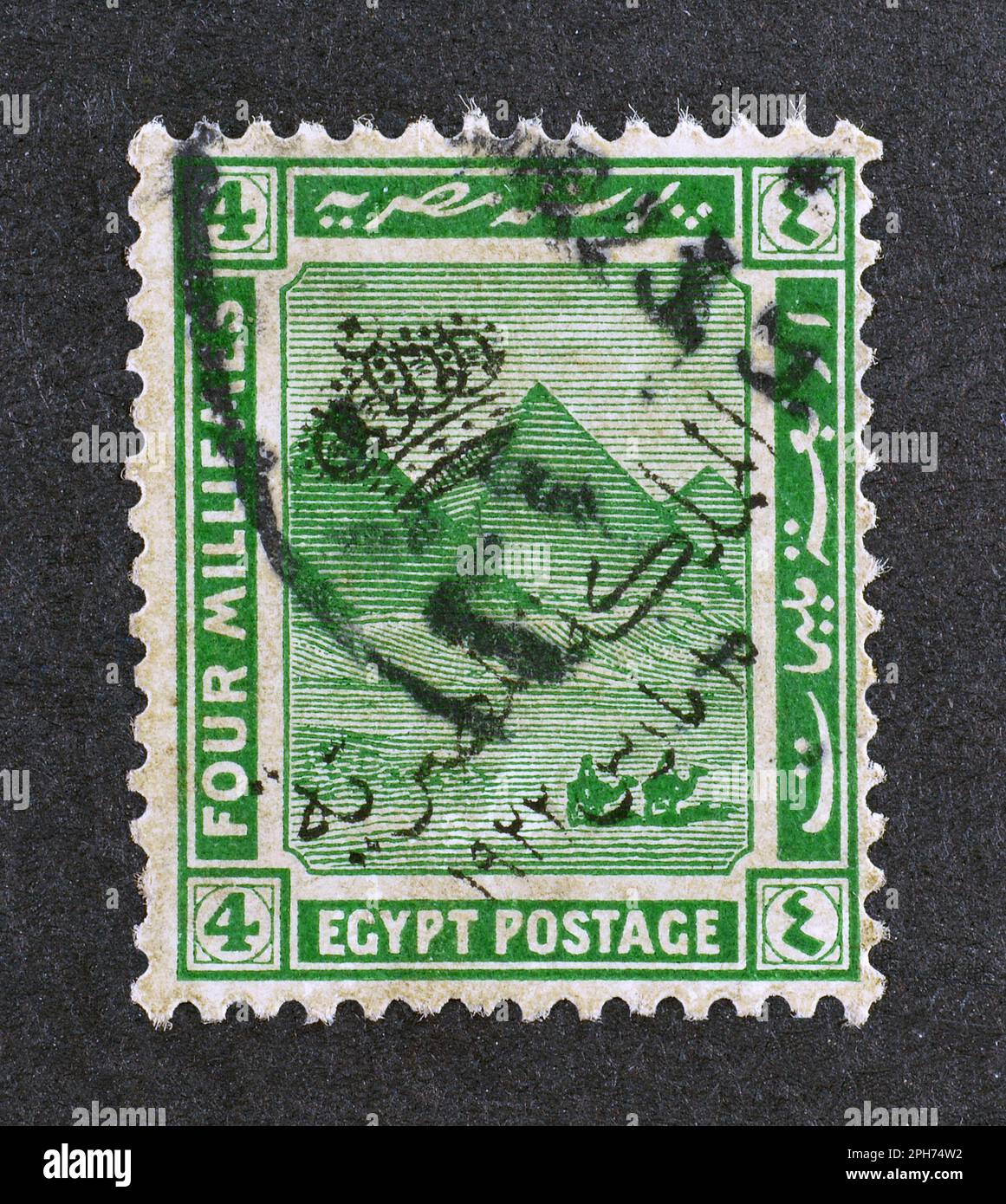 Cancelled postage stamp printed by Egypt, that shows Pyramids, Crown ...