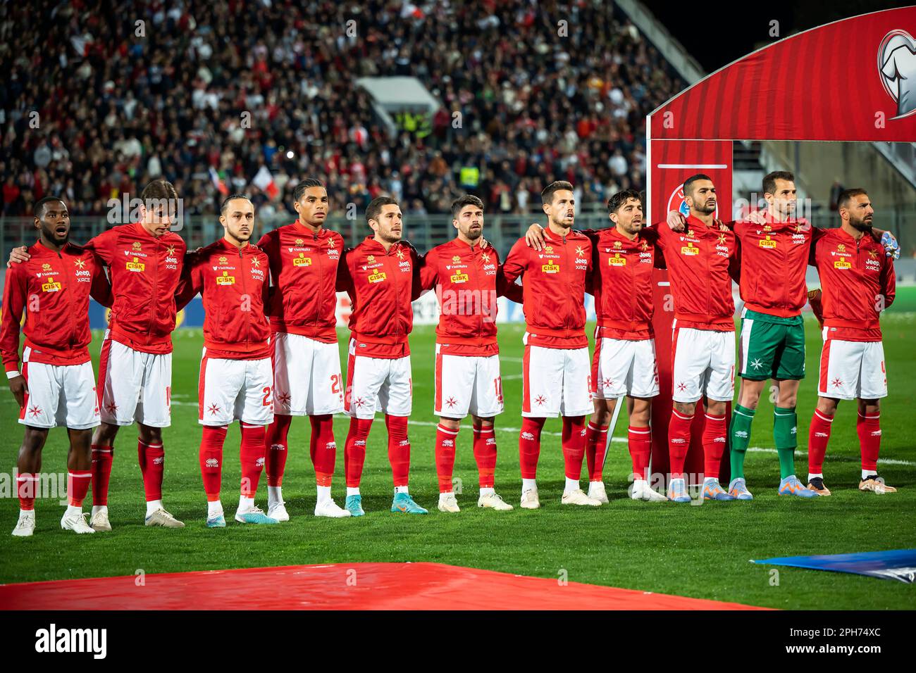 Malta's players stand before the Euro 2024 group C qualifying soccer ...