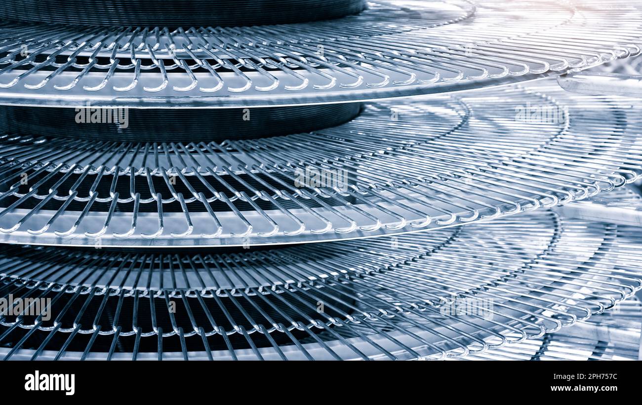 moving tcircular spiral automatic conveyor Stock Photo - Alamy