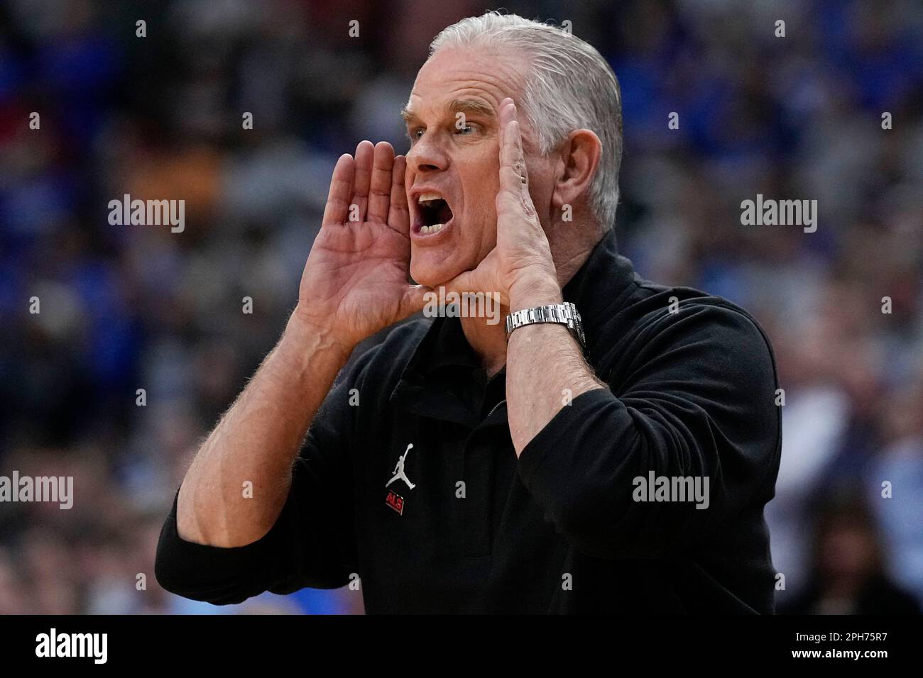 San Diego State head coach Brian Dutcher speaks in the second half of a ...