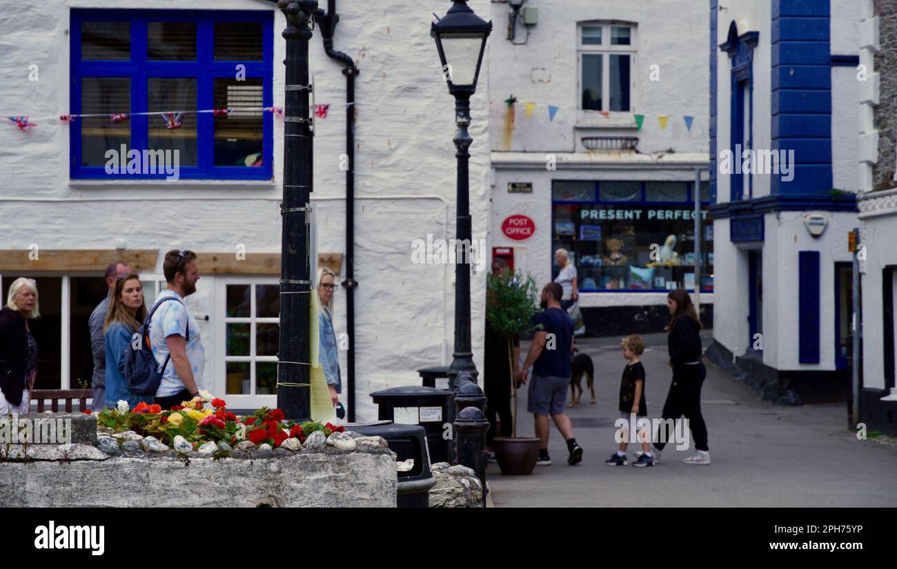 Picturesque Cornish villages such as Polperro are popular with tourists ...