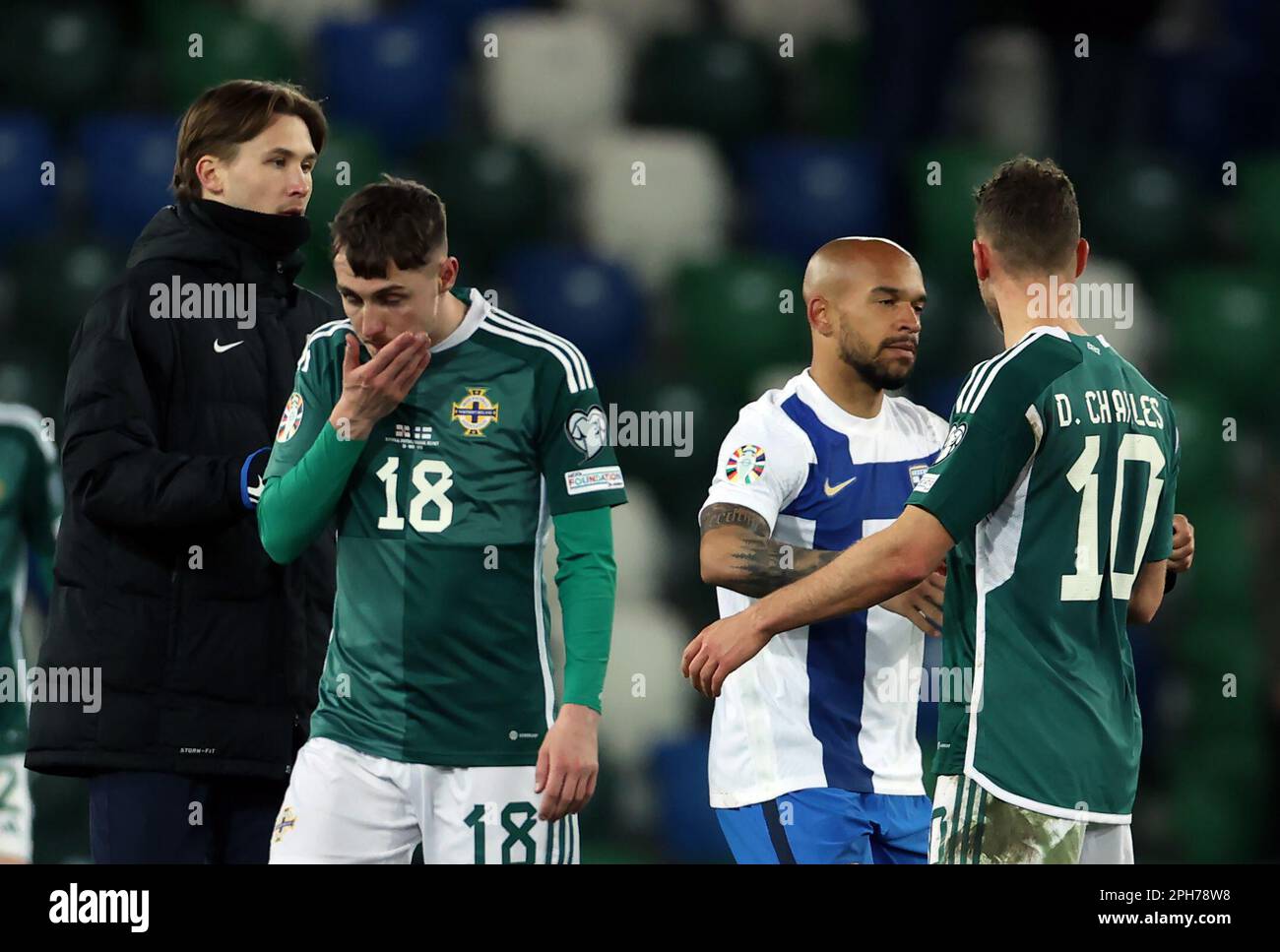 Northern Ireland's Gavin Whyte and Dion Charles react following during ...