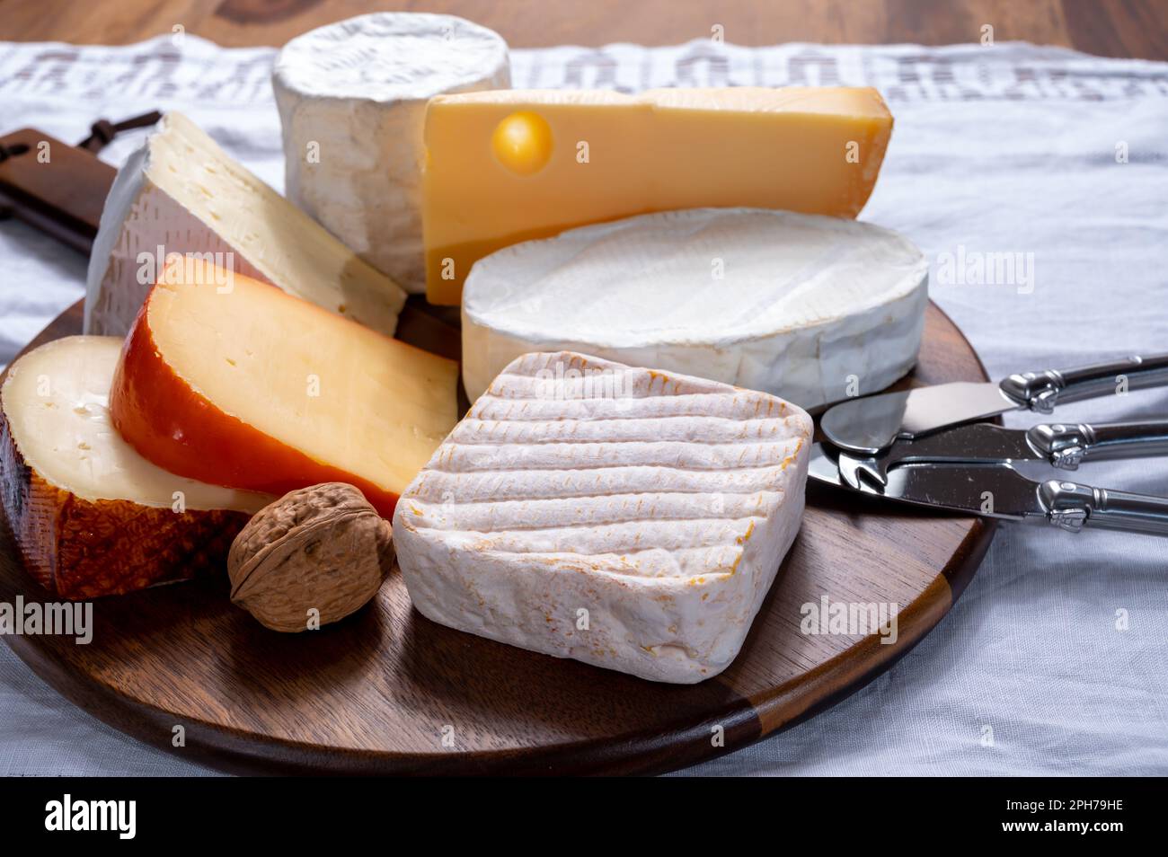Collection of Belgian cheeses, soft yellow cow milk cheese with white ...