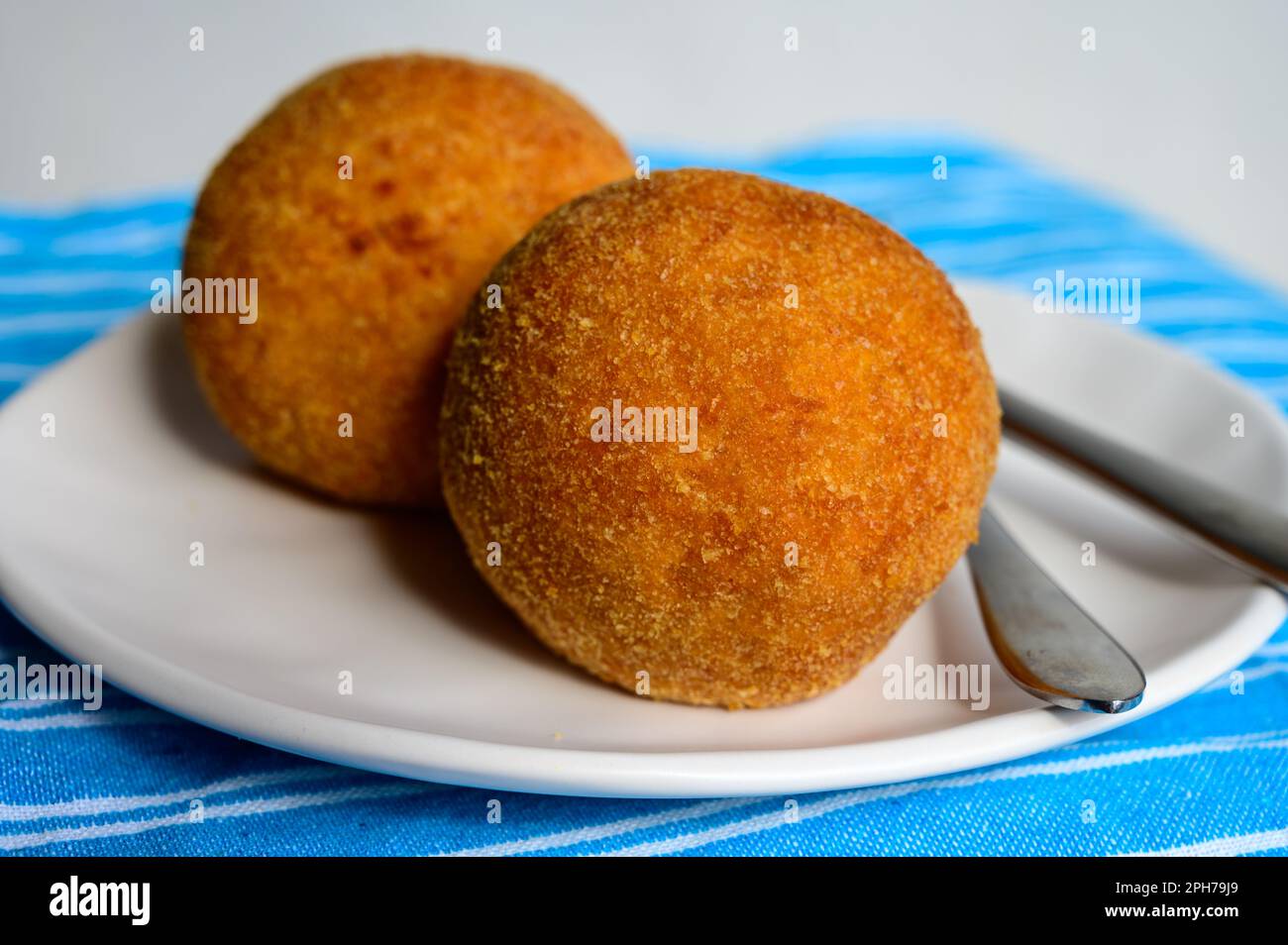 Traditional street food in UK, stuffed fried Scotch eggs with ...