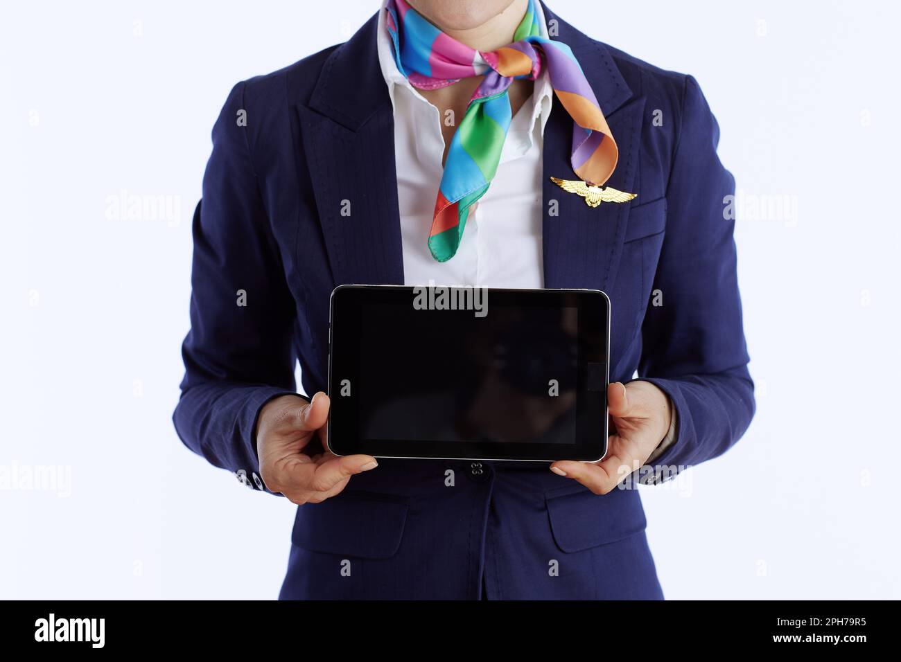 Closeup on elegant flight attendant woman isolated on white background ...