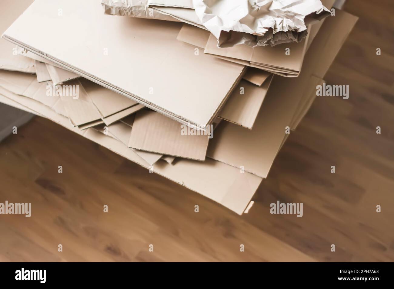 Cardboard and paper stack Stock Photo - Alamy