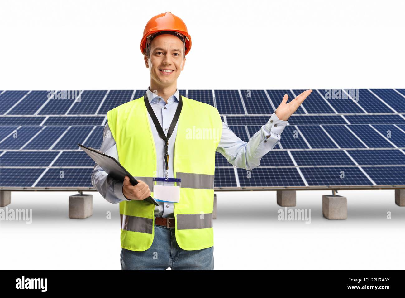Engineer wearing a reflective vest and helmet and presenting a solar ...