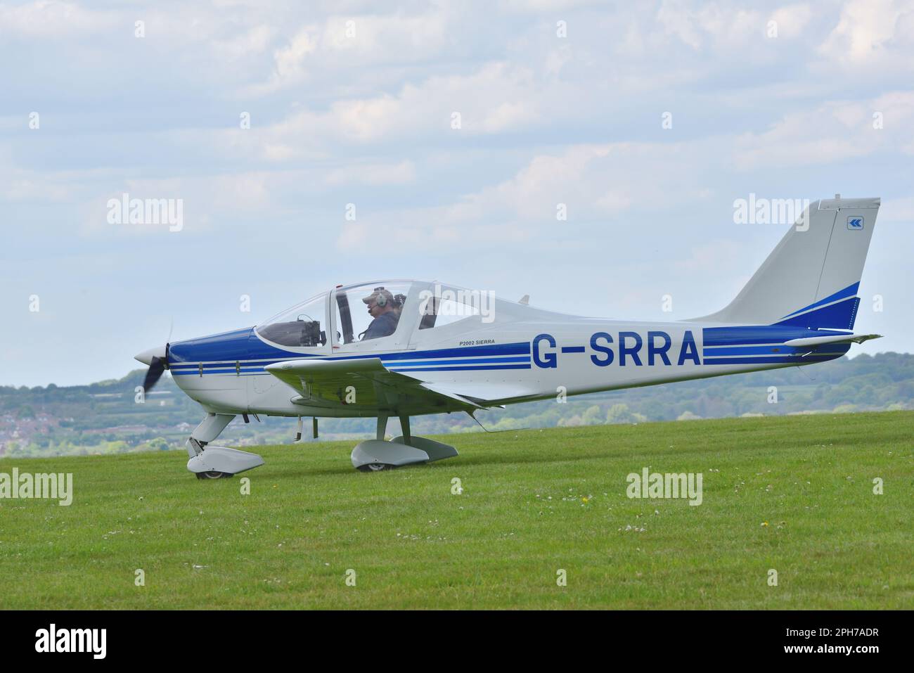 The pilot of Tecnam P2002-EA Sierra G-SRRA taxis to the parking area ...