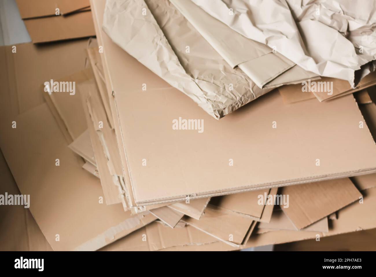 Cardboard and paper stack Stock Photo - Alamy