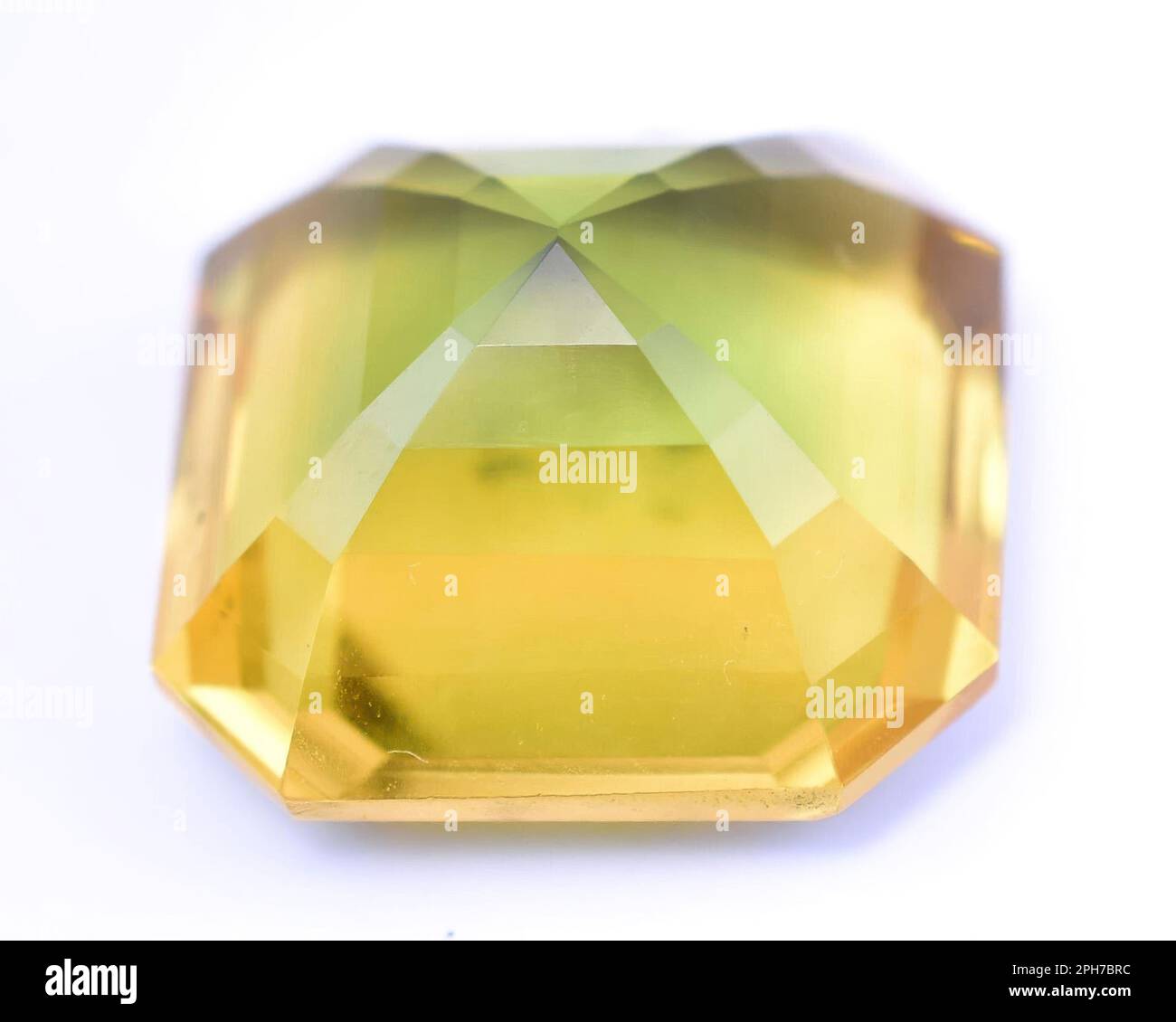 Natural gemstone yellow tourmaline on white background Stock Photo - Alamy
