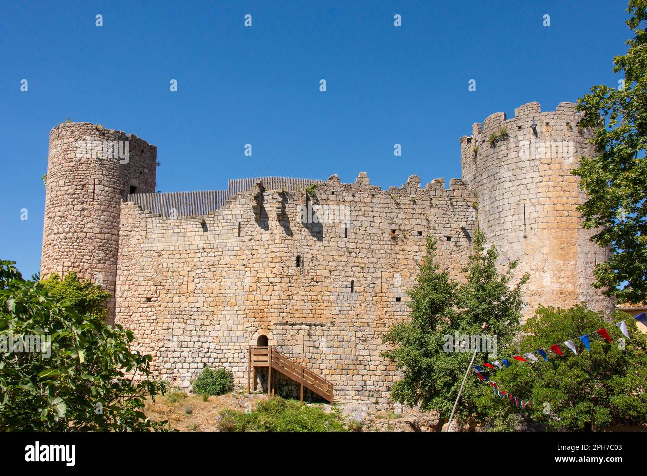 The almost square castle of Villerouge-Termenès sits in a valley of the ...