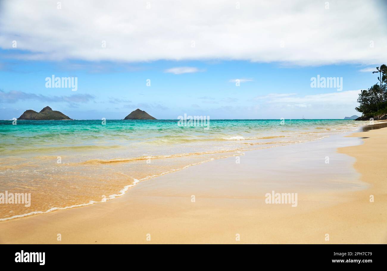 Lanikai Beach with the Mokulua Islands in the background on the ...