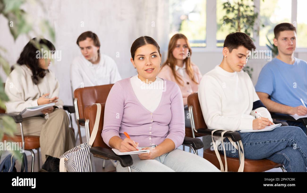 Teenager students listening in classroom school Stock Photo - Alamy
