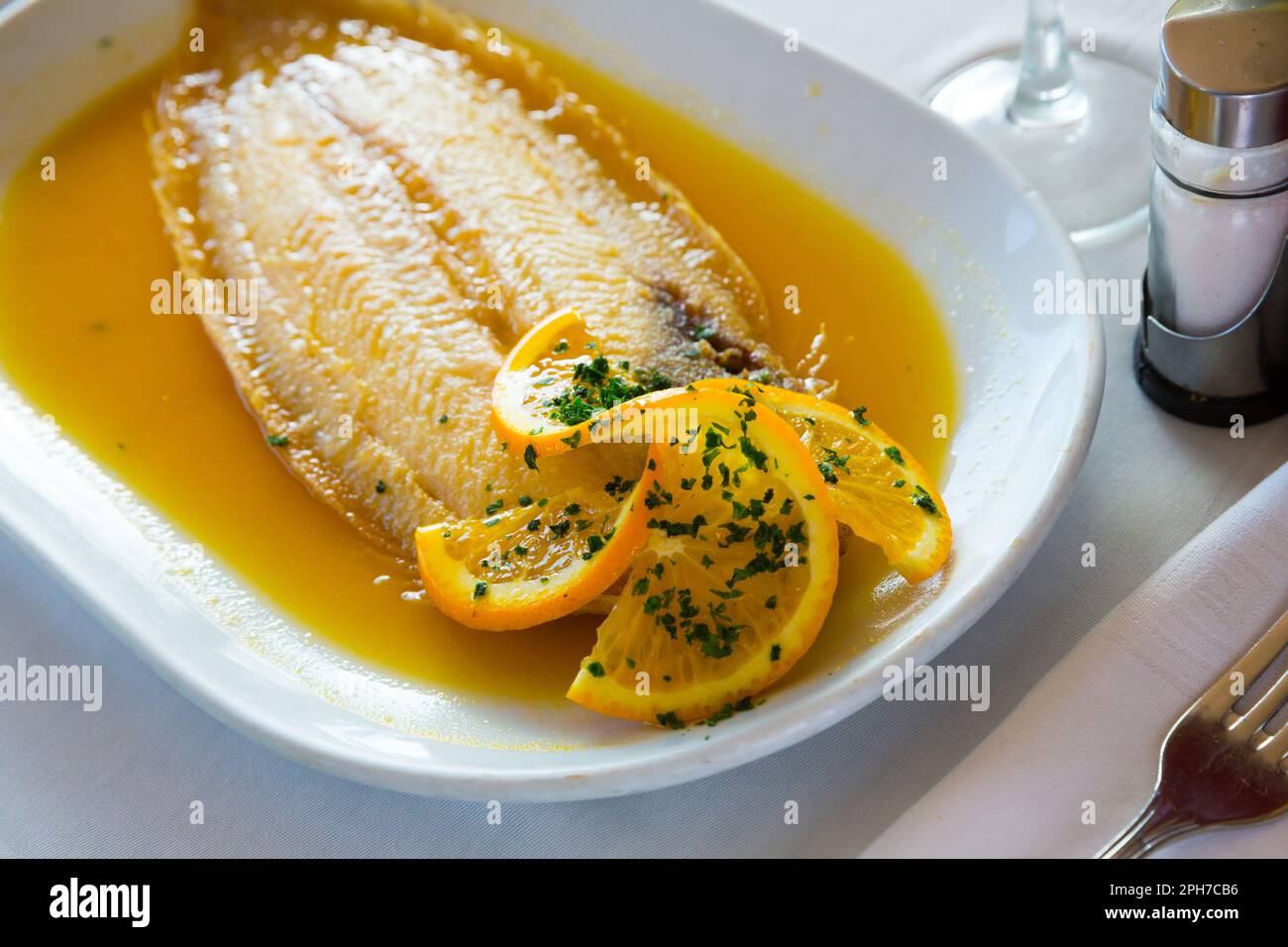 Dover sole cooked with orange Stock Photo - Alamy