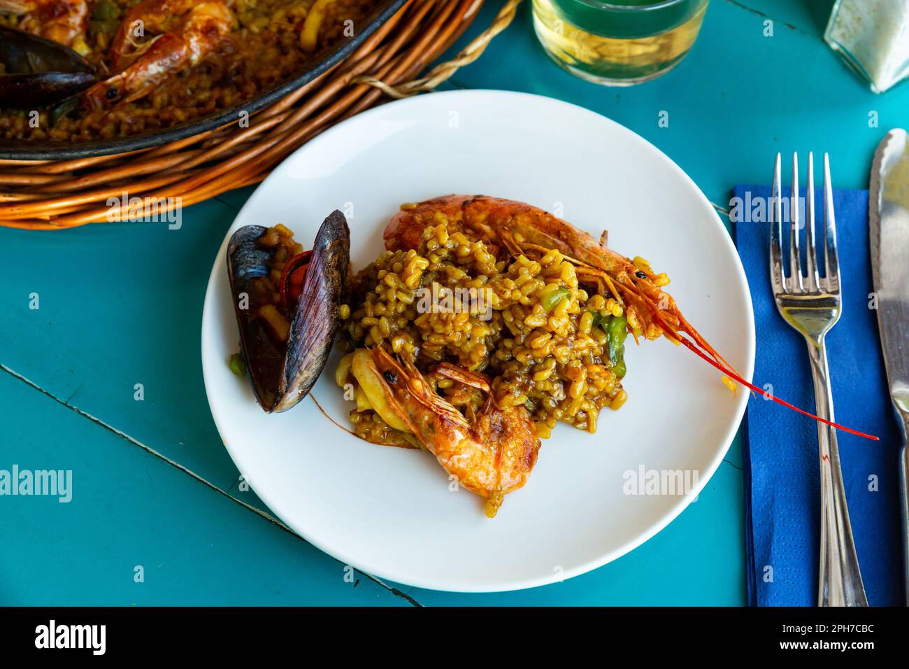 Delicious traditional Valencian seafood paella - savory rice dish with ...