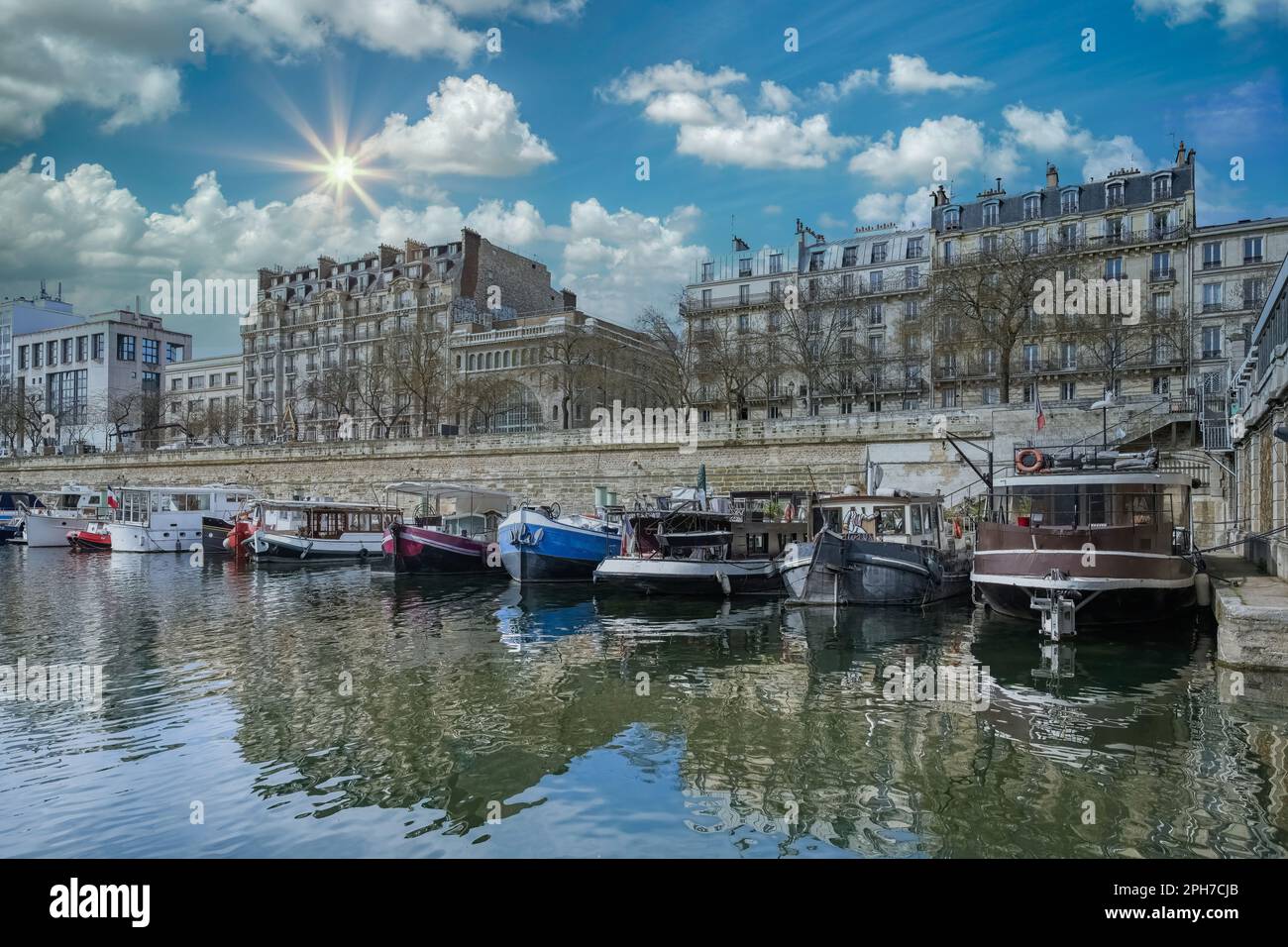 Paris, Bastille, beautiful harbor with houseboats, and typical facade ...