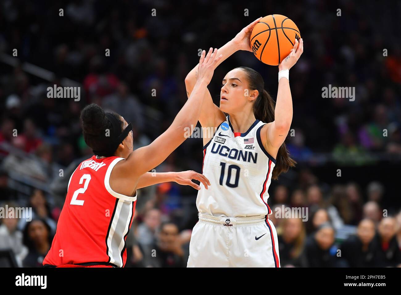 March 25, 2023: UConn Huskies guard Nika Muhl (10) looks to pass during ...