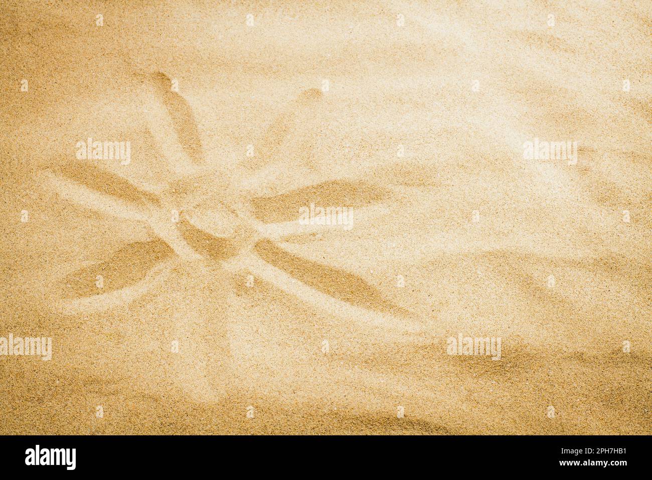 Sun drawing on sand at beach hi-res stock photography and images - Alamy