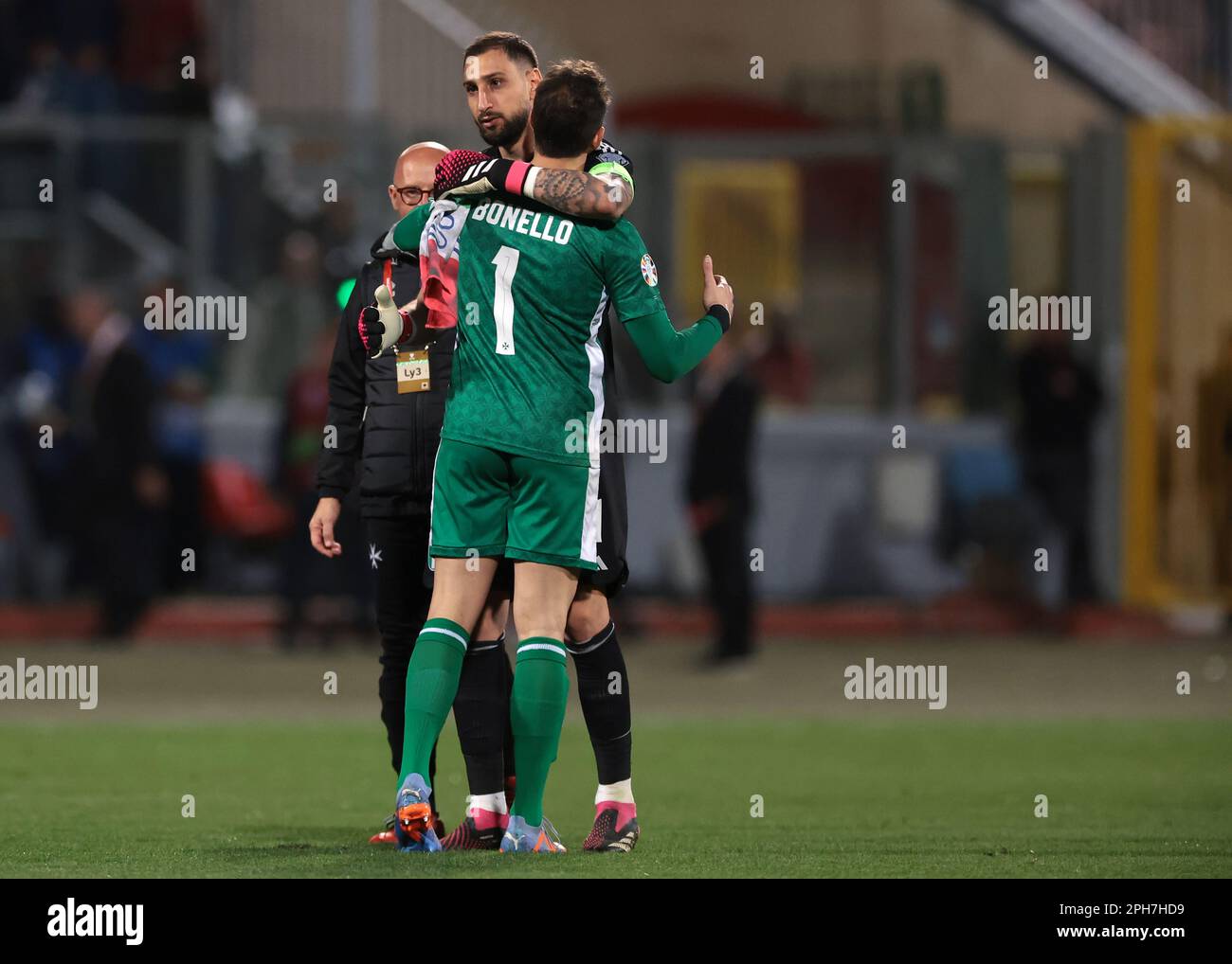 Attard, Malta, 26th March 2023. Gianluigi Donnarumma of Italy embraces ...
