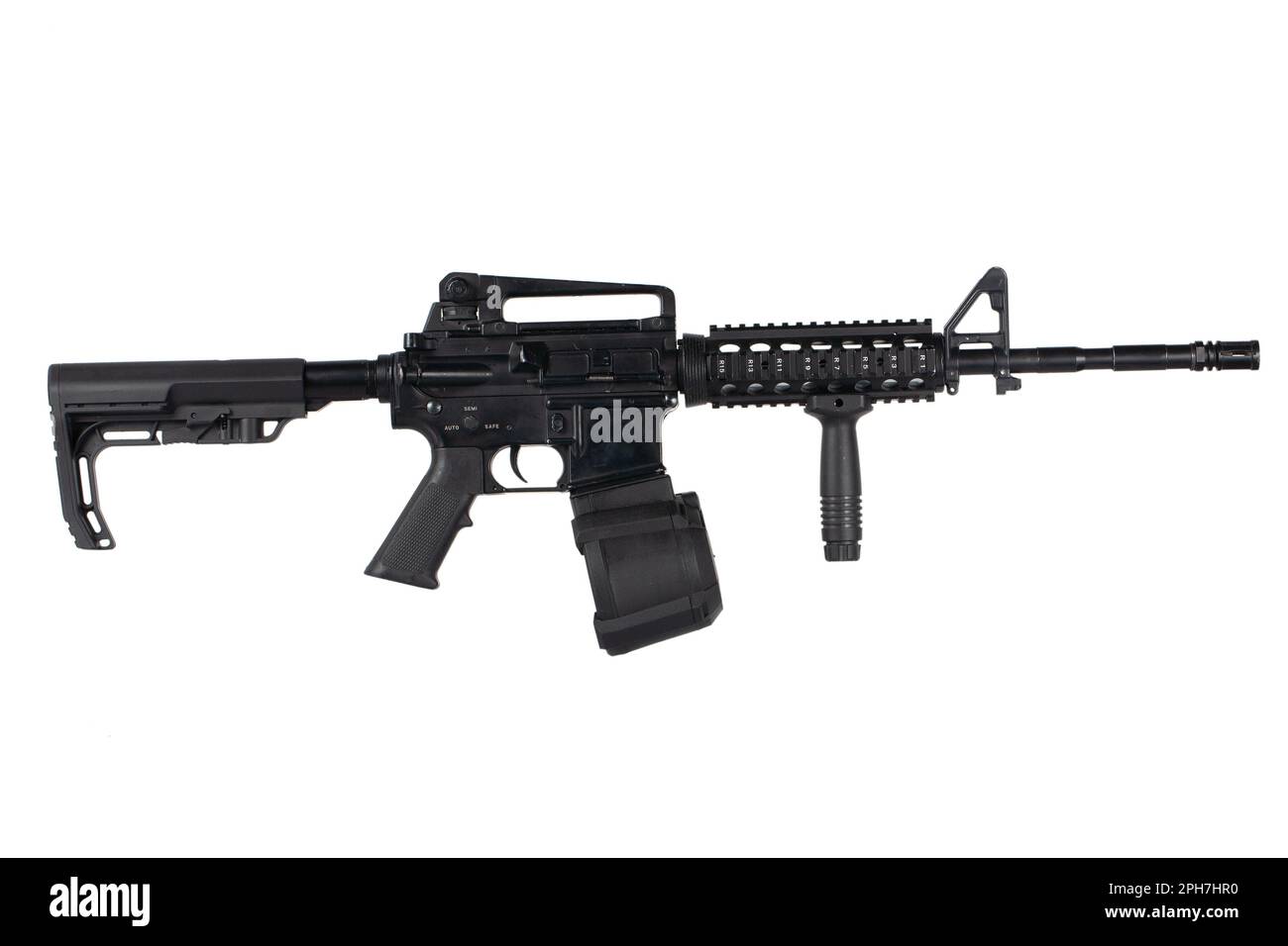 M4 assault rifle with drum magazine isolated on a white background ...