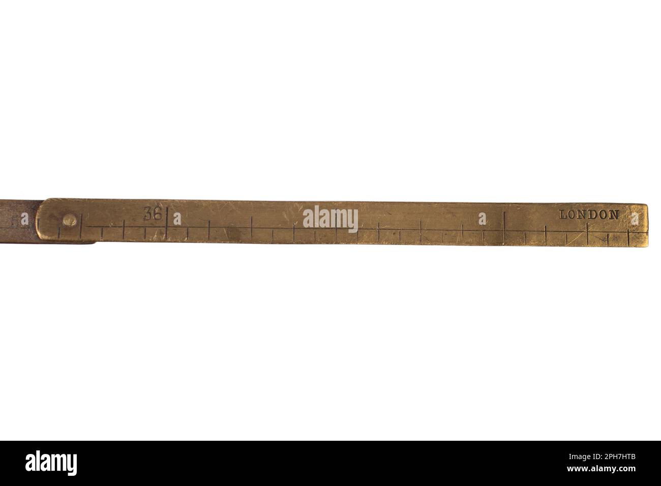 Antique carpenter's brass ruler with London mark isolated on white ...