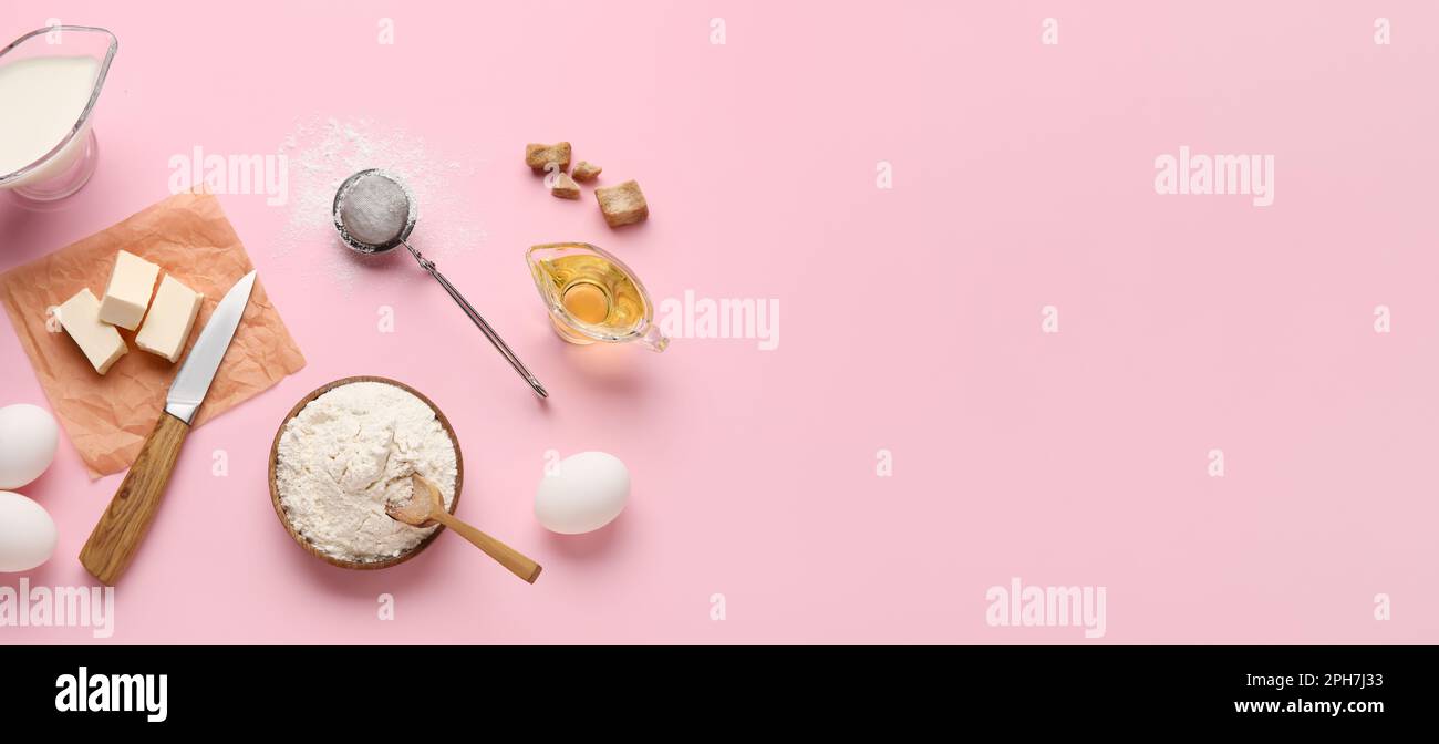 Different ingredients for baking on pink background with space for text ...