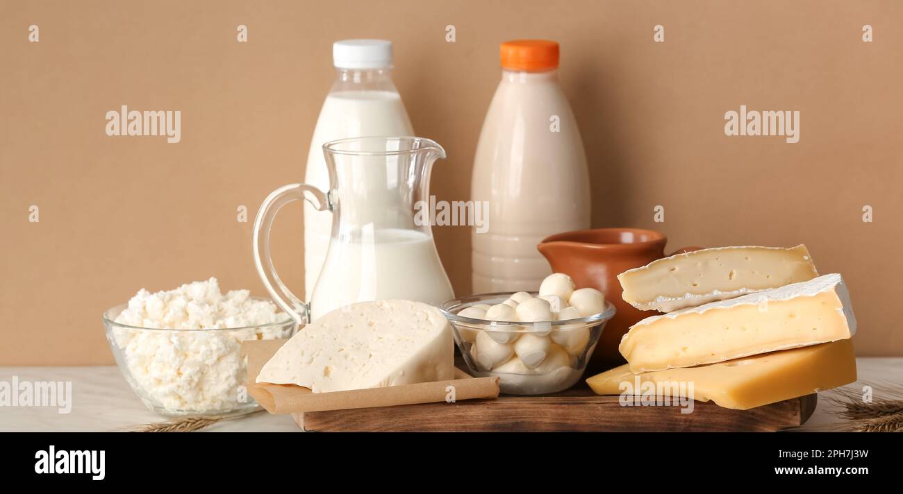 Different fresh dairy products on table Stock Photo - Alamy