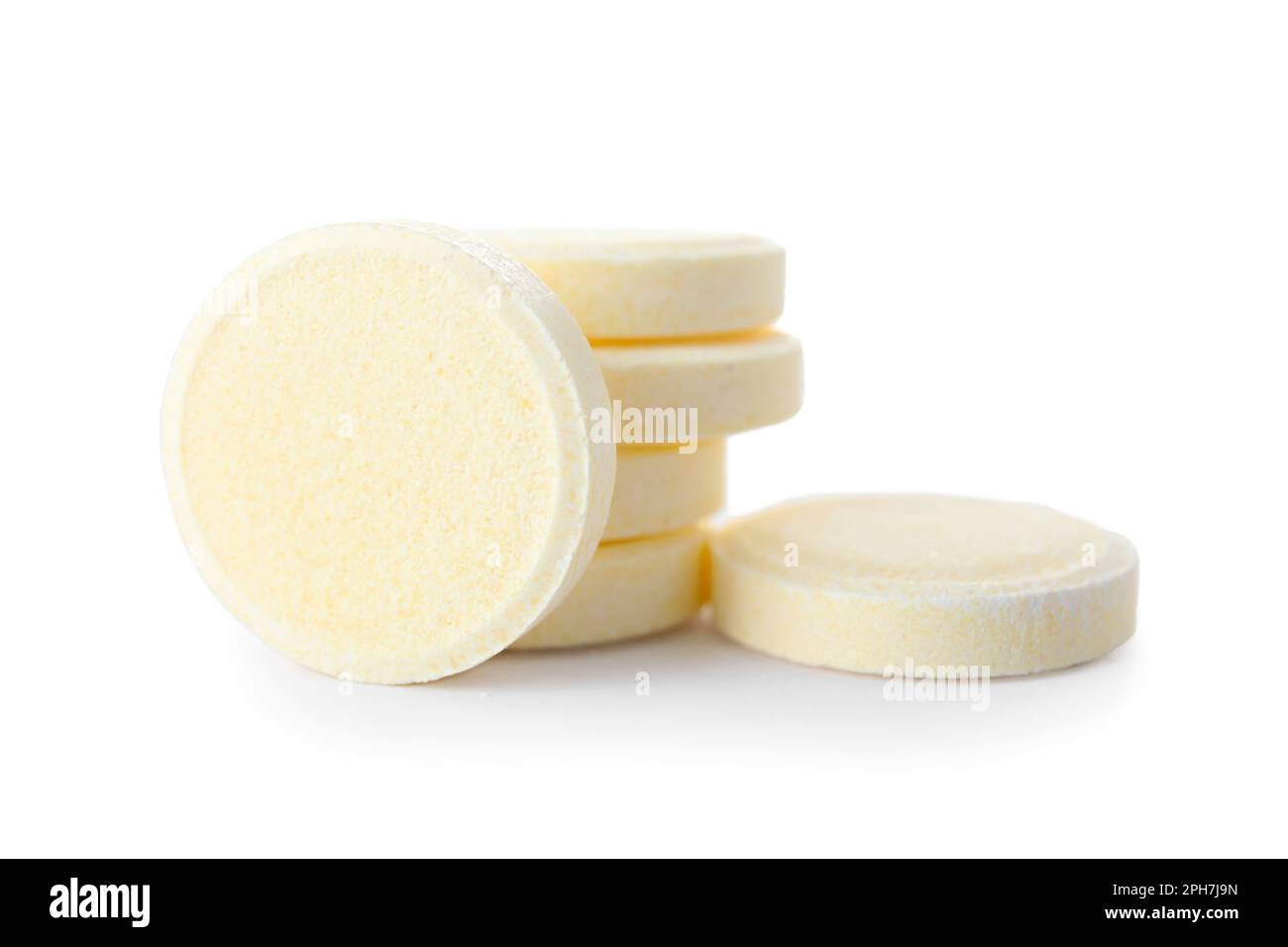Yellow soluble tablets isolated on white background Stock Photo - Alamy