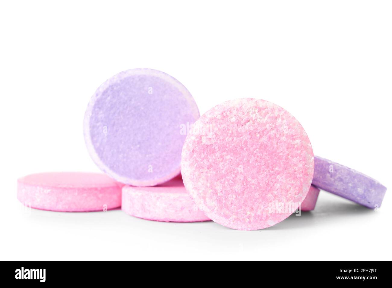 Pink and lilac soluble tablets isolated on white background Stock Photo ...