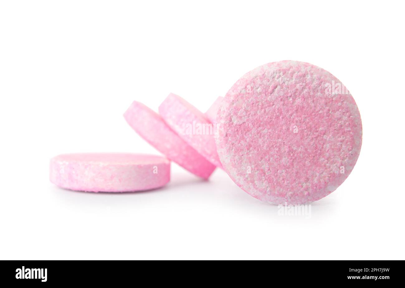 Pink soluble tablets isolated on white background Stock Photo - Alamy