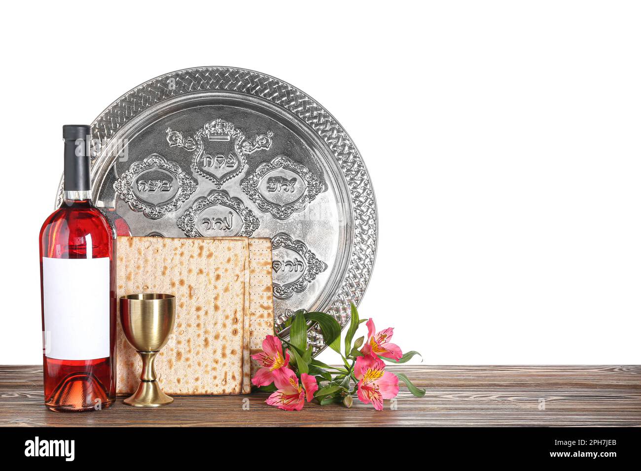 Bottle of wine, cup, Passover Seder plate, flatbread matza and ...